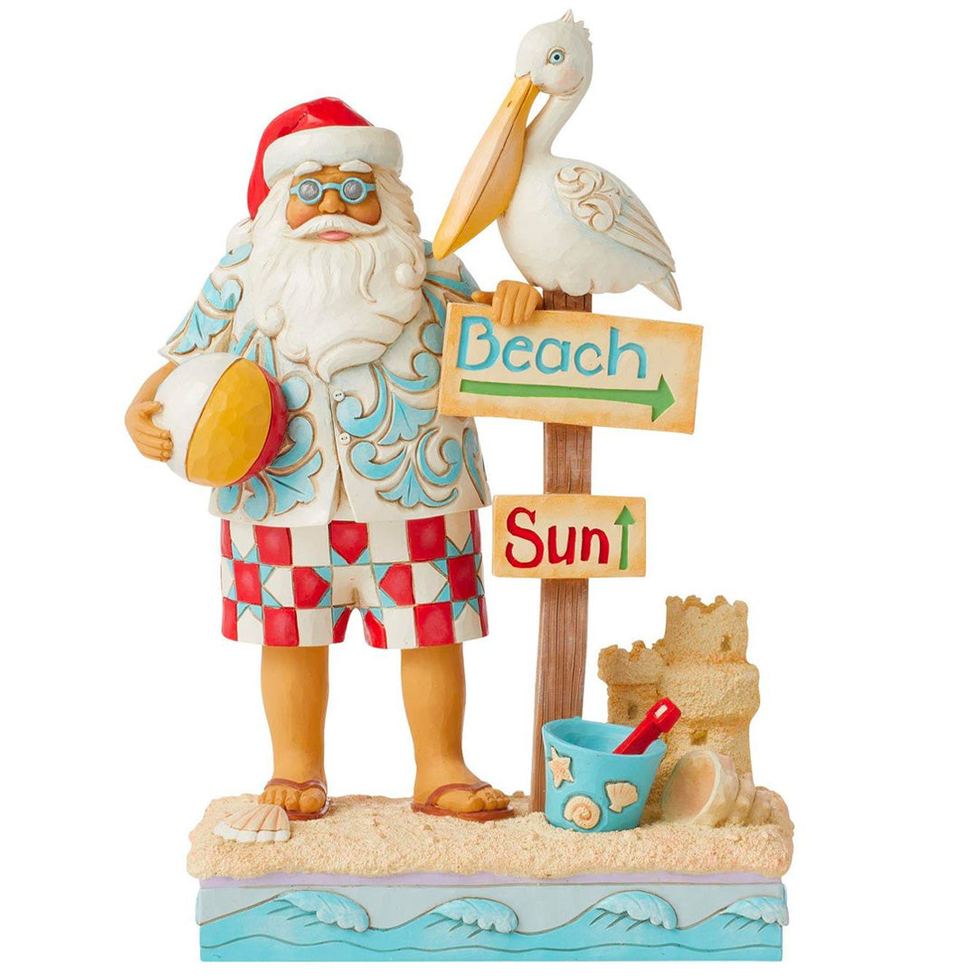 Santa with Signs and Pelican by Jim Shore – Cuddle Decor